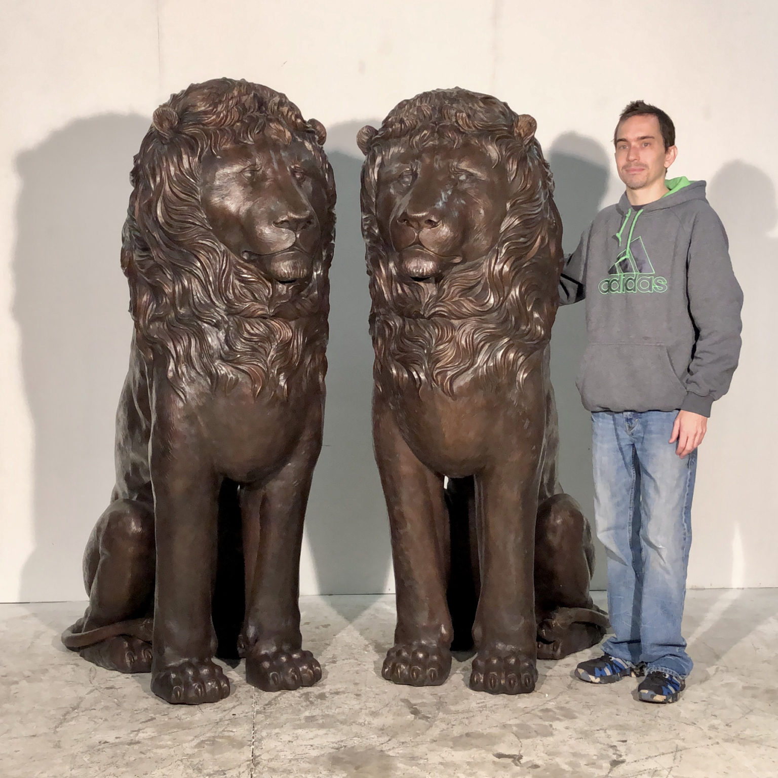 Bronze Six Foot Sitting Lions Sculpture Pair - Metropolitan Galleries Inc.
