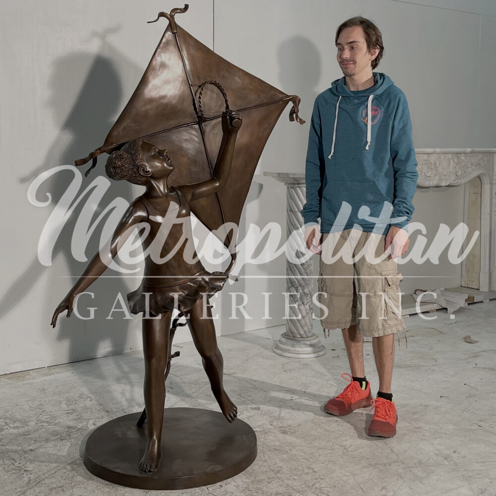 Bronze Little Girl Flying Kite Sculpture - Metropolitan Galleries Inc.